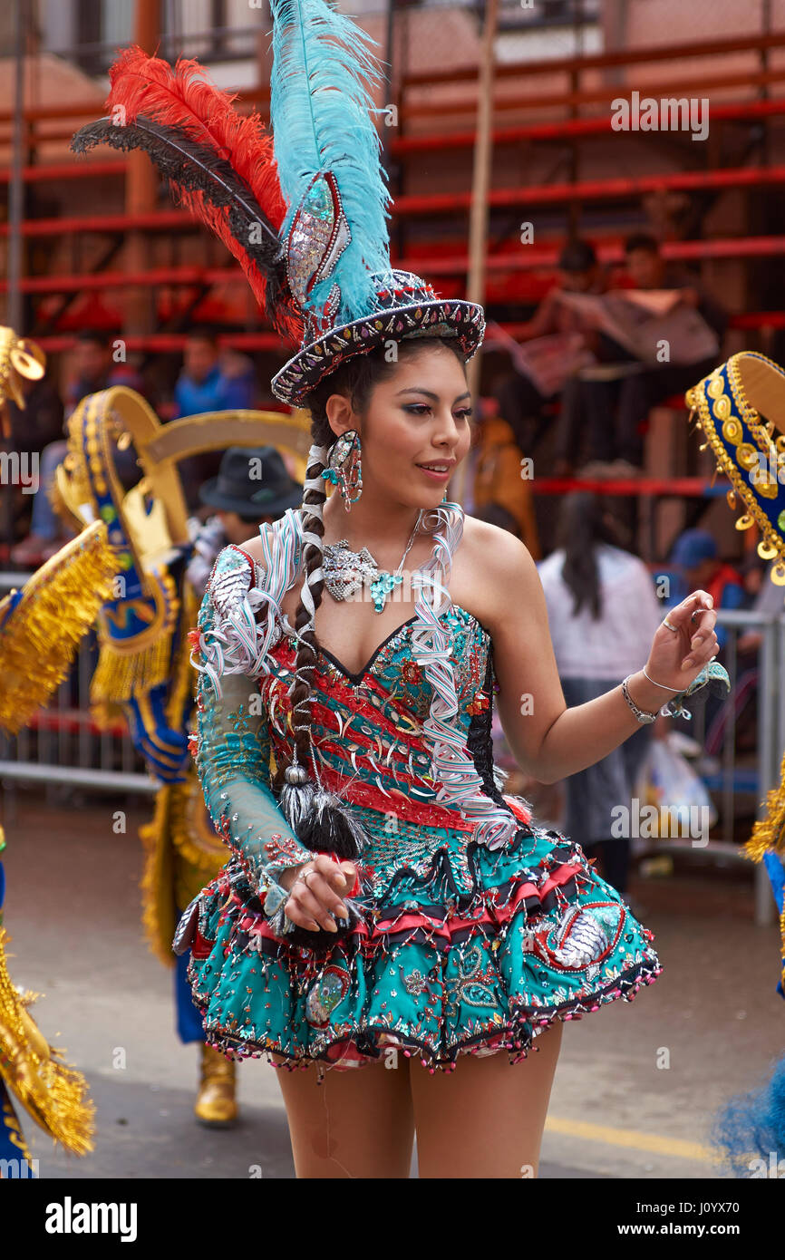 Morenada dancer in colourful costume parading through the mining city ...
