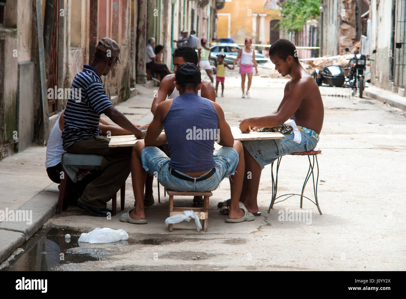 Cuban man playing a boardgame in Havana, Cuba Stock Photo - Alamy
