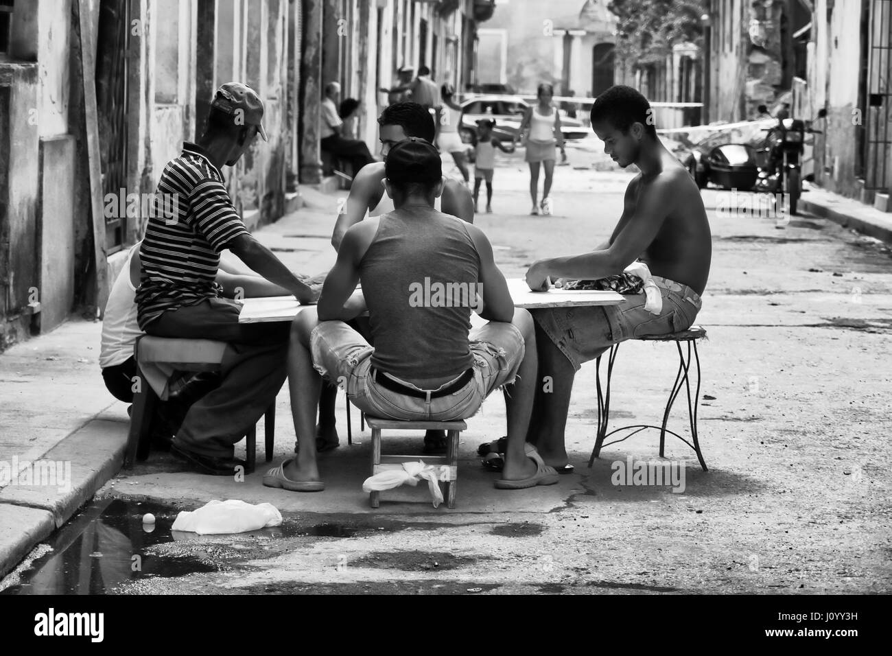 Cuban man playing a boardgame in Havana, Cuba Stock Photo - Alamy