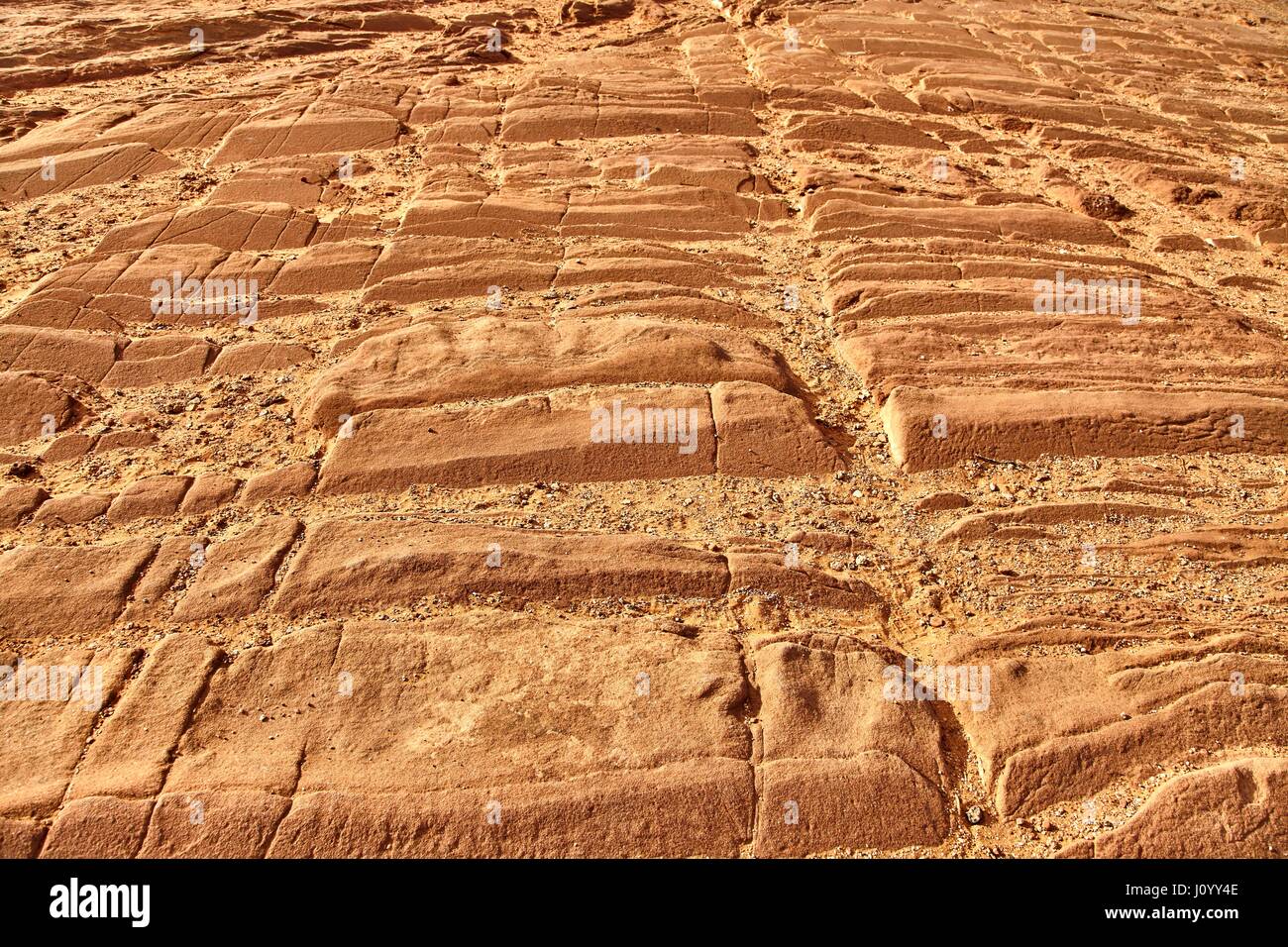 Beautiful old red stone wall texture background Stock Photo - Alamy