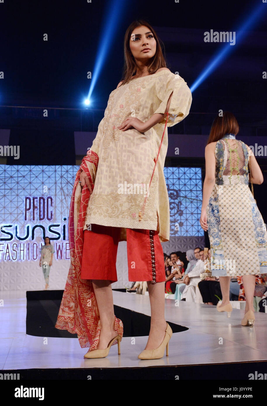 Lahore, Pakistan. 07th Aug, 2013. Pakistani model presents a creation ...