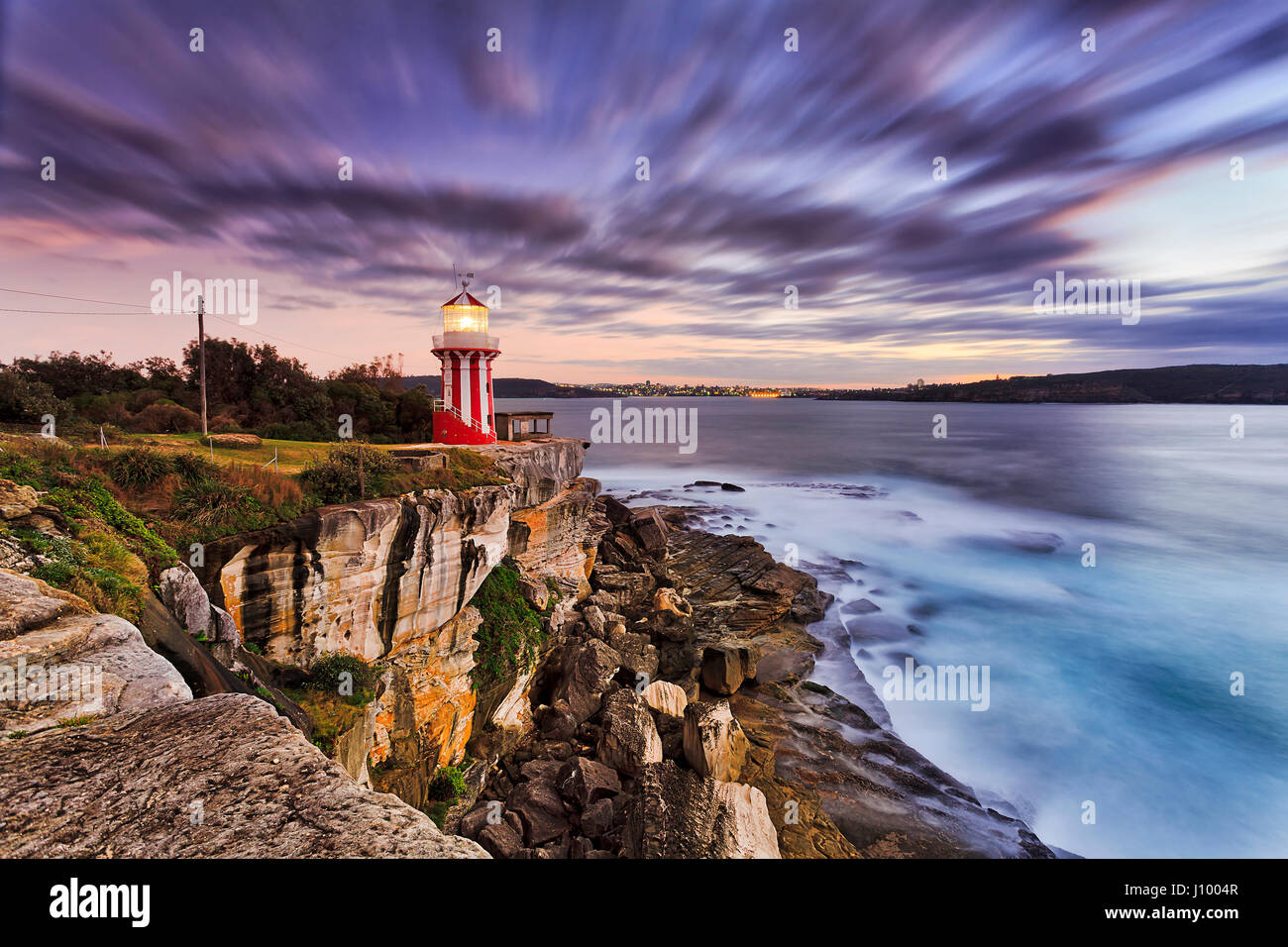 Lighthouse clearing path on rock hi-res stock photography and images ...