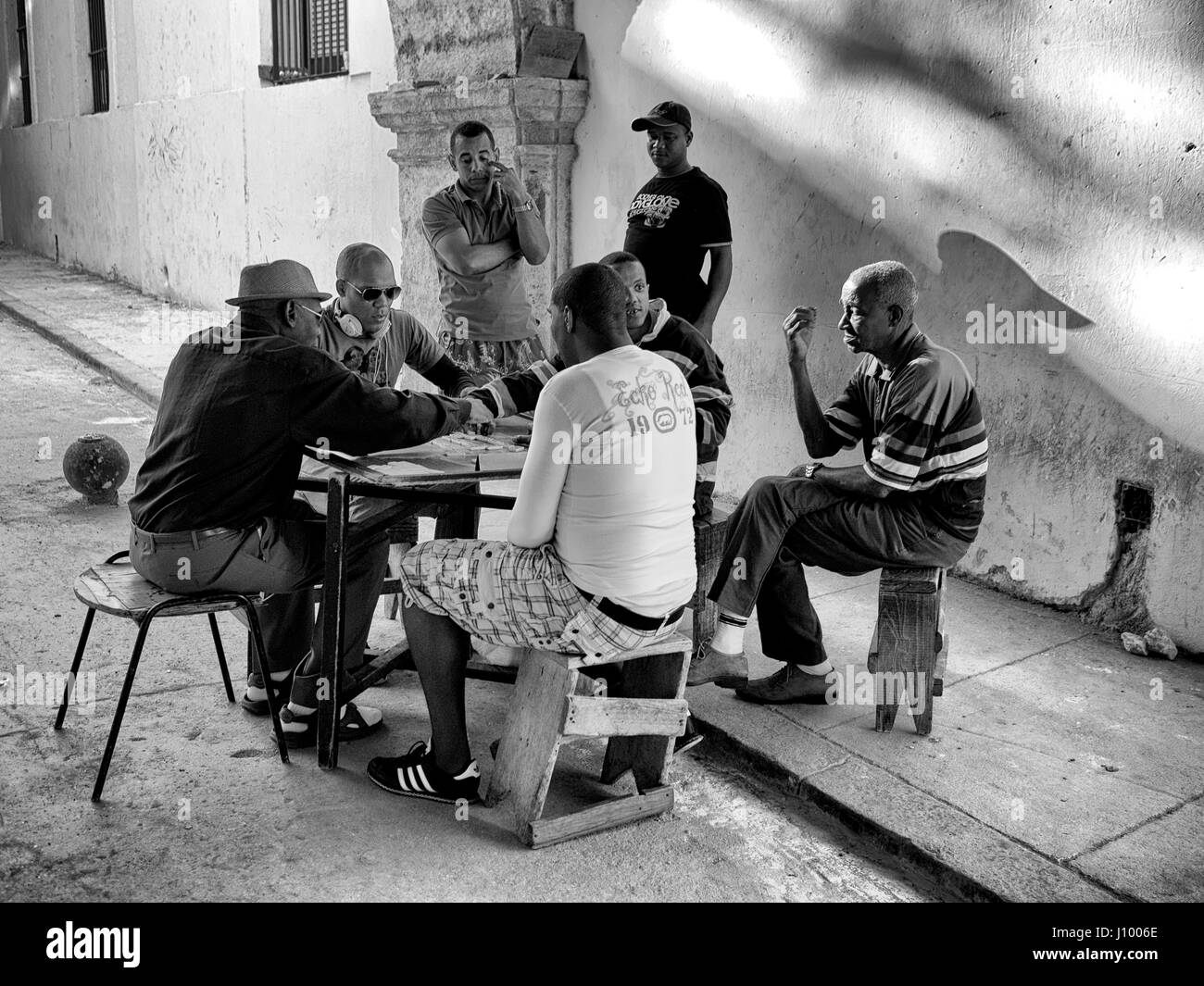 Cuban man playing a boardgame in Havana, Cuba Stock Photo - Alamy