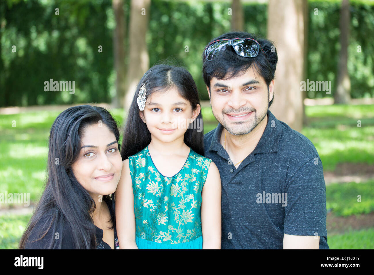 Closeup portrait, happy family enjoying time together, isolated outside ...