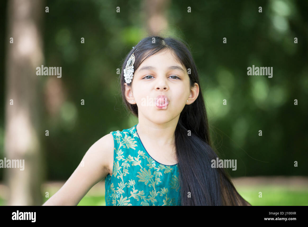 Closeup Portrait Young Girl Sticking Tongue Out Making Funny Faces