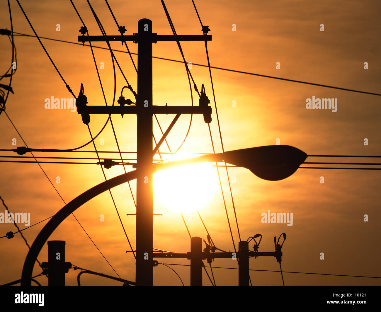 Sunset and Pole Stock Photo - Alamy