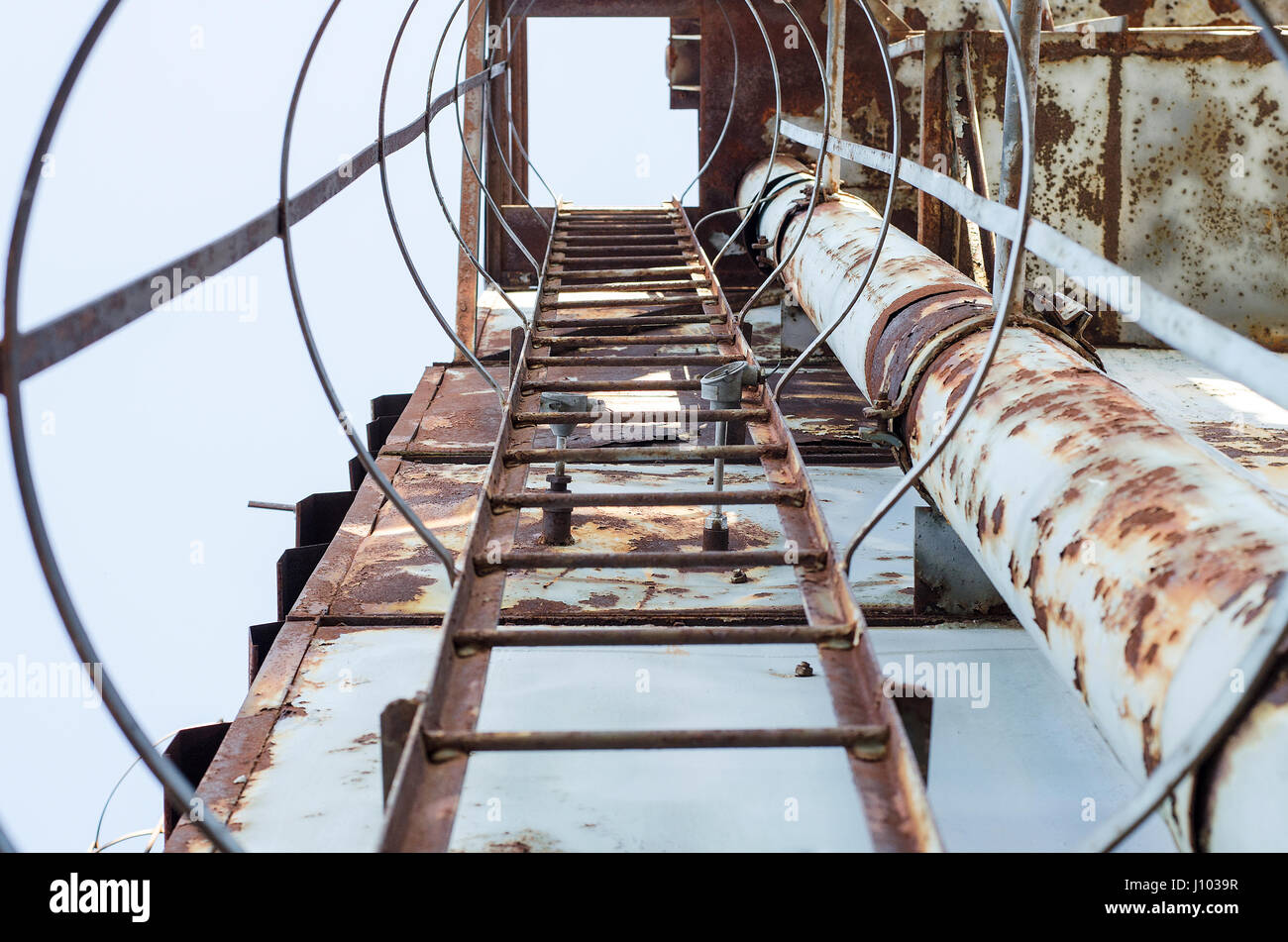 Rusty ladder on an abandoned building site Stock Photo - Alamy