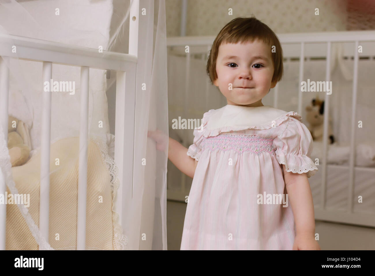 litle kid stand at bedroom Stock Photo - Alamy