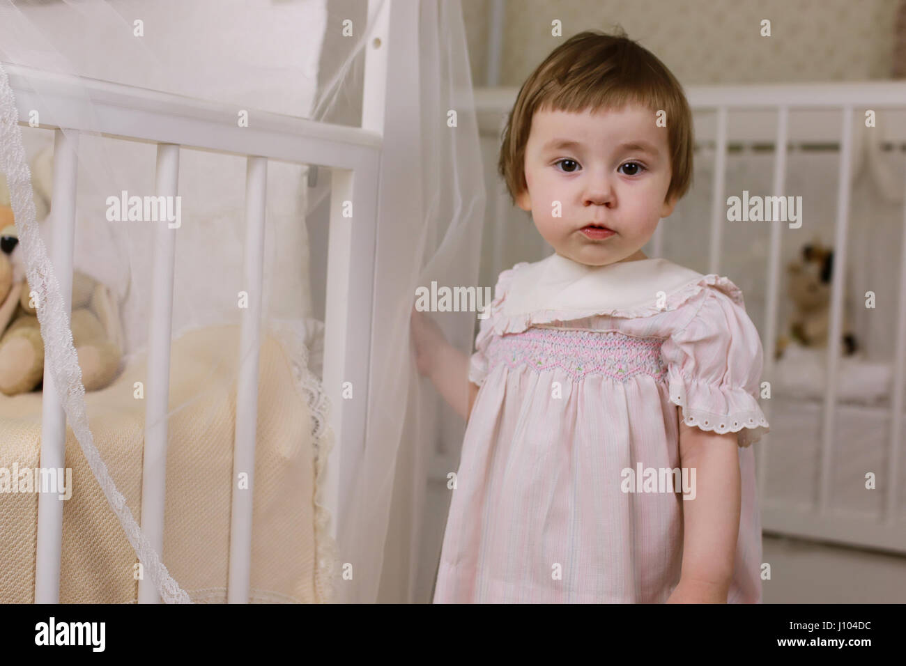 litle kid stand at bedroom Stock Photo - Alamy