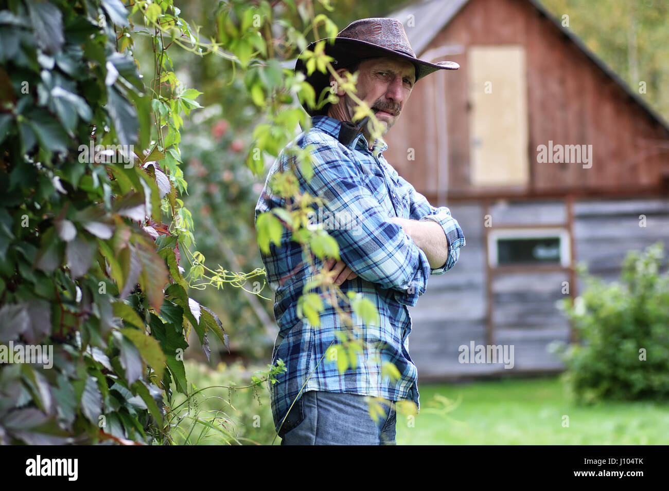 cowboy man smoke pipe Stock Photo - Alamy