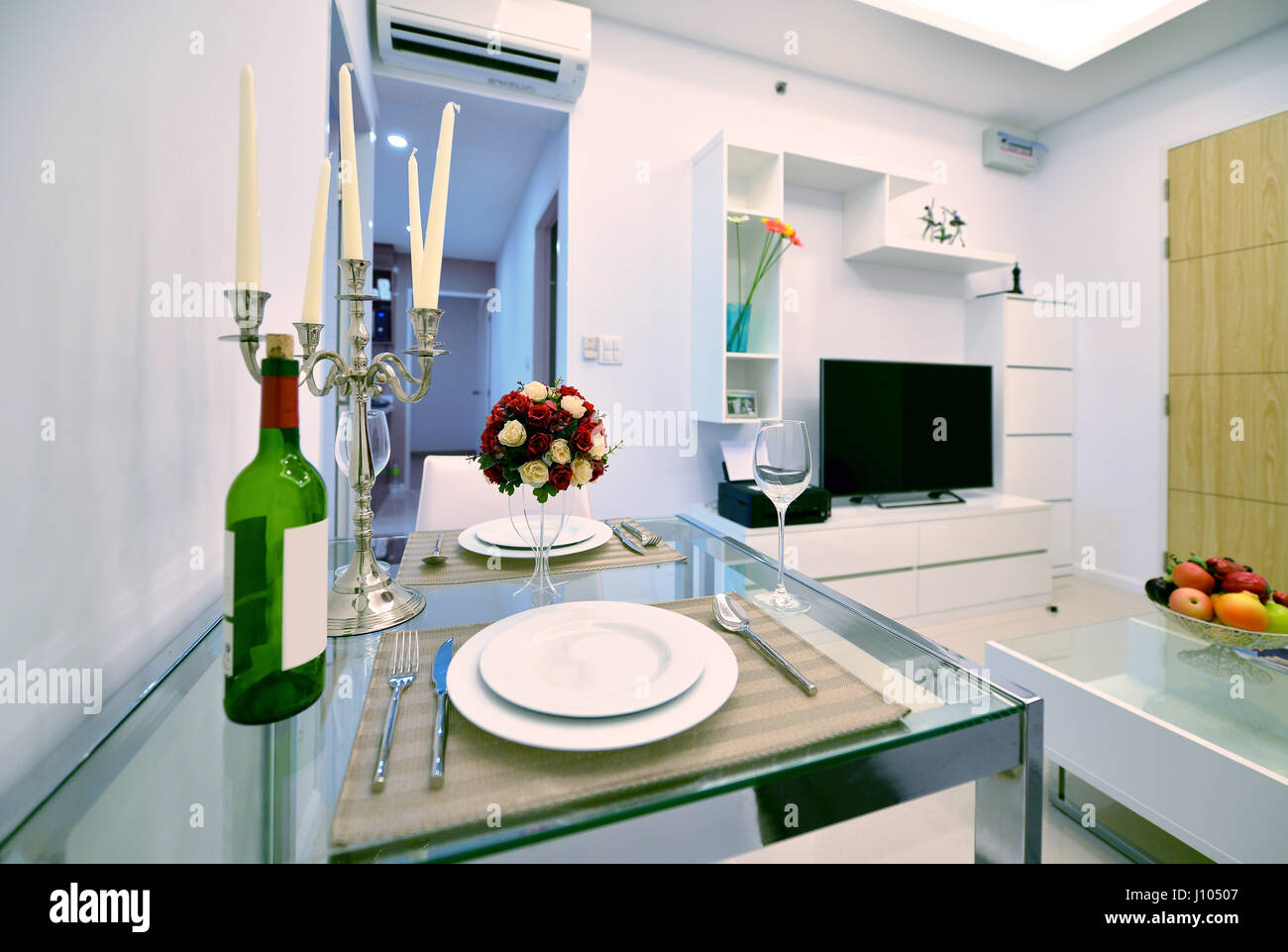 dining table with table set in modern home, interior design Stock Photo ...