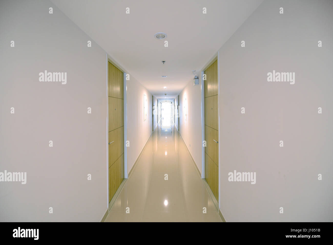 Condo Corridor with wooden doors in condominium, modern design Stock ...