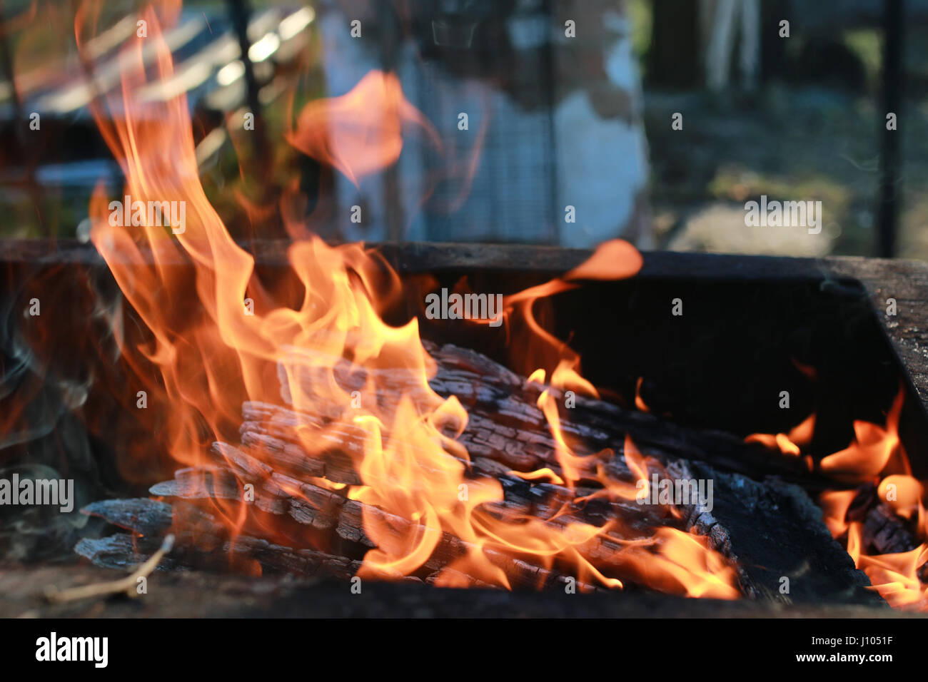 Burning wood and coals inside stove hi-res stock photography and images ...