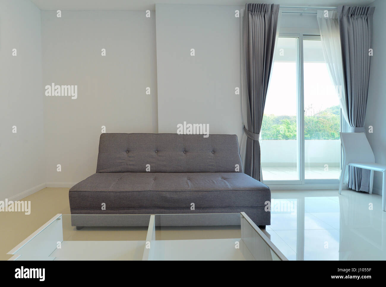 modern sofa in white living room with window, interior design Stock ...