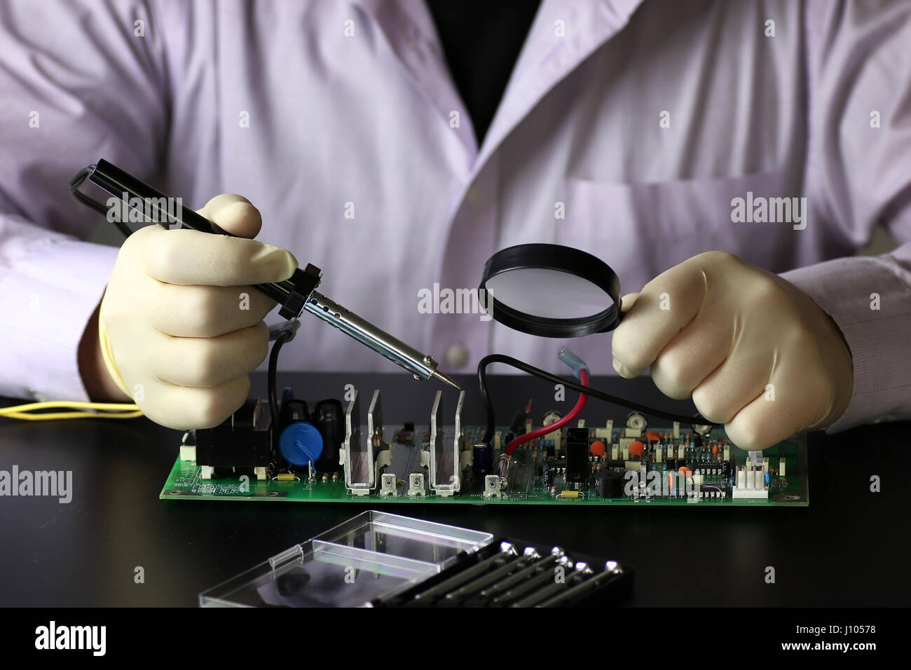 Chip soldering man hands hi-res stock photography and images - Alamy