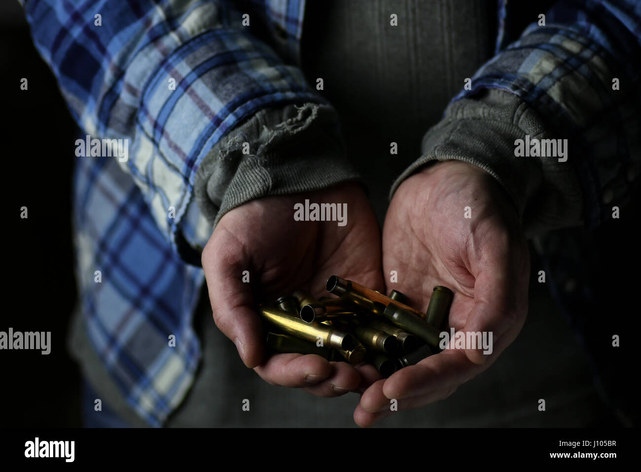 sleeves weapon in a hands Stock Photo - Alamy