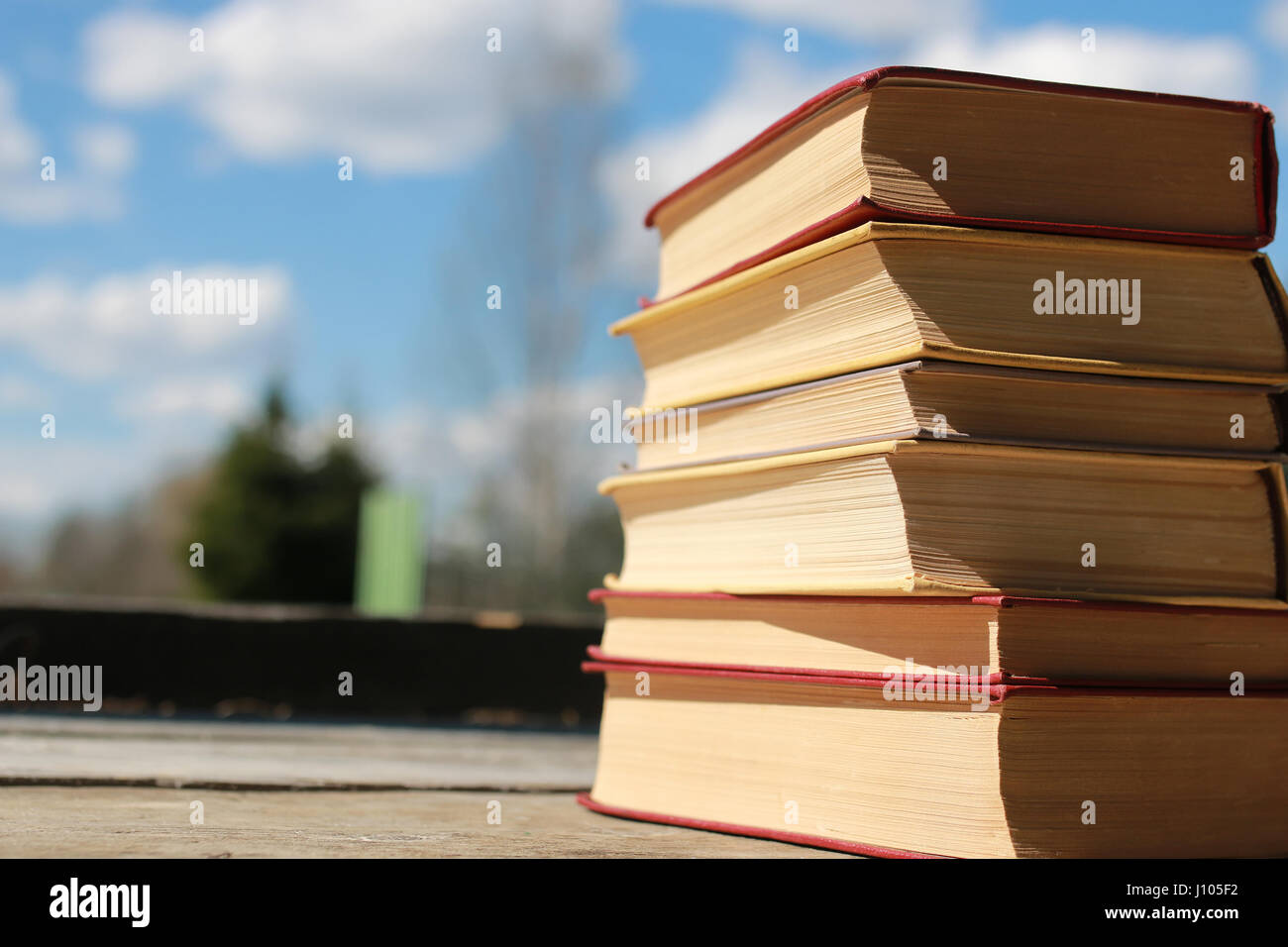 books standing on a table Stock Photo - Alamy