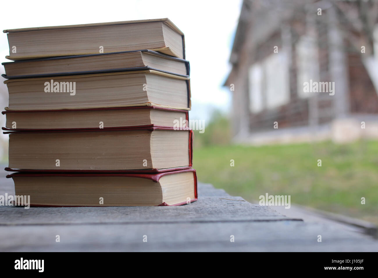 books standing on a table Stock Photo - Alamy