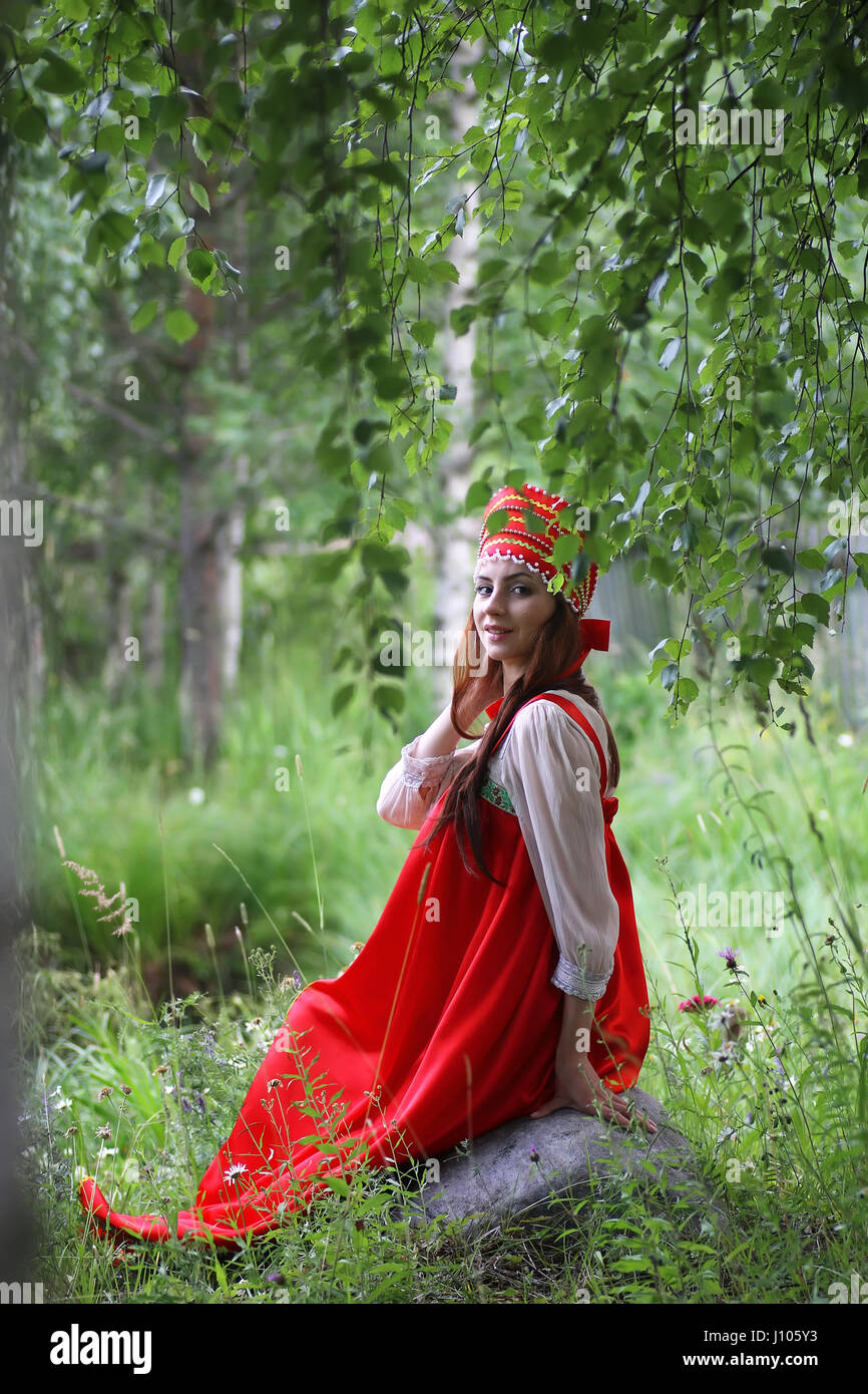 Slav in traditional dress is sitting in nature Stock Photo - Alamy