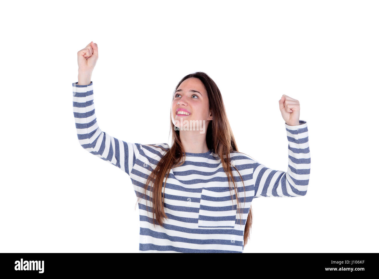 Happy teenager girl celebrating something leaving her hands isolated on ...