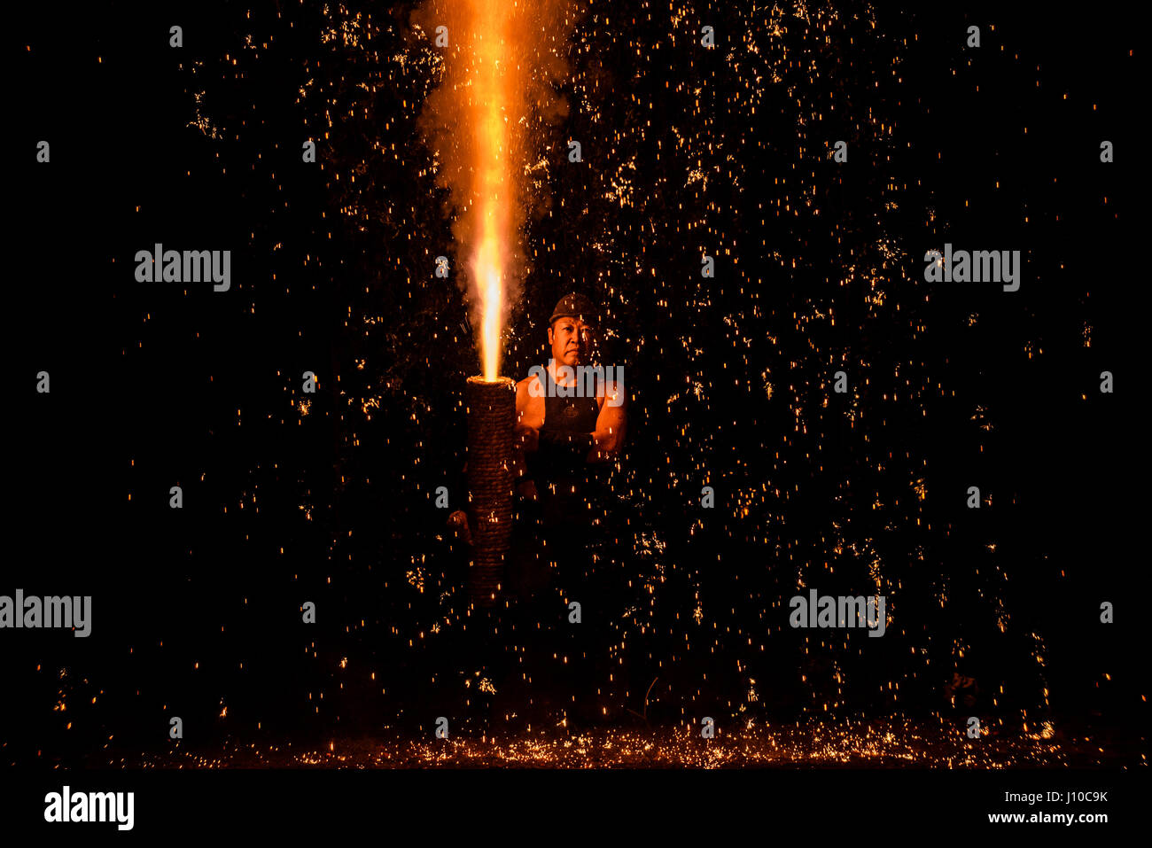 APRIL 15, 2017 - Men launch handheld fireworks, known as tezutsu hanabi ...