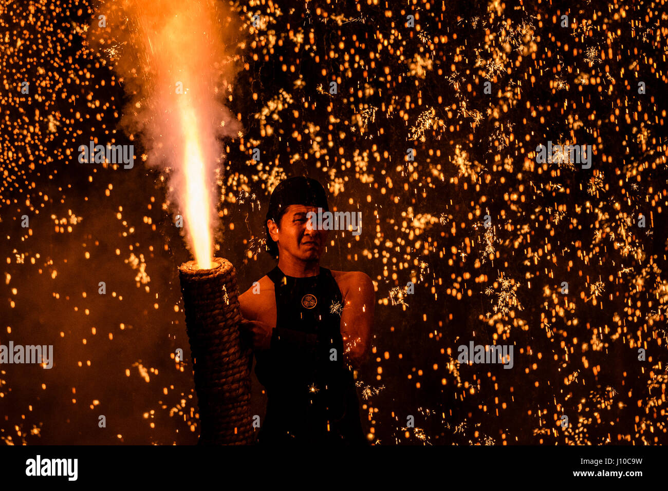 APRIL 15, 2017 - Men launch handheld fireworks, known as tezutsu hanabi ...