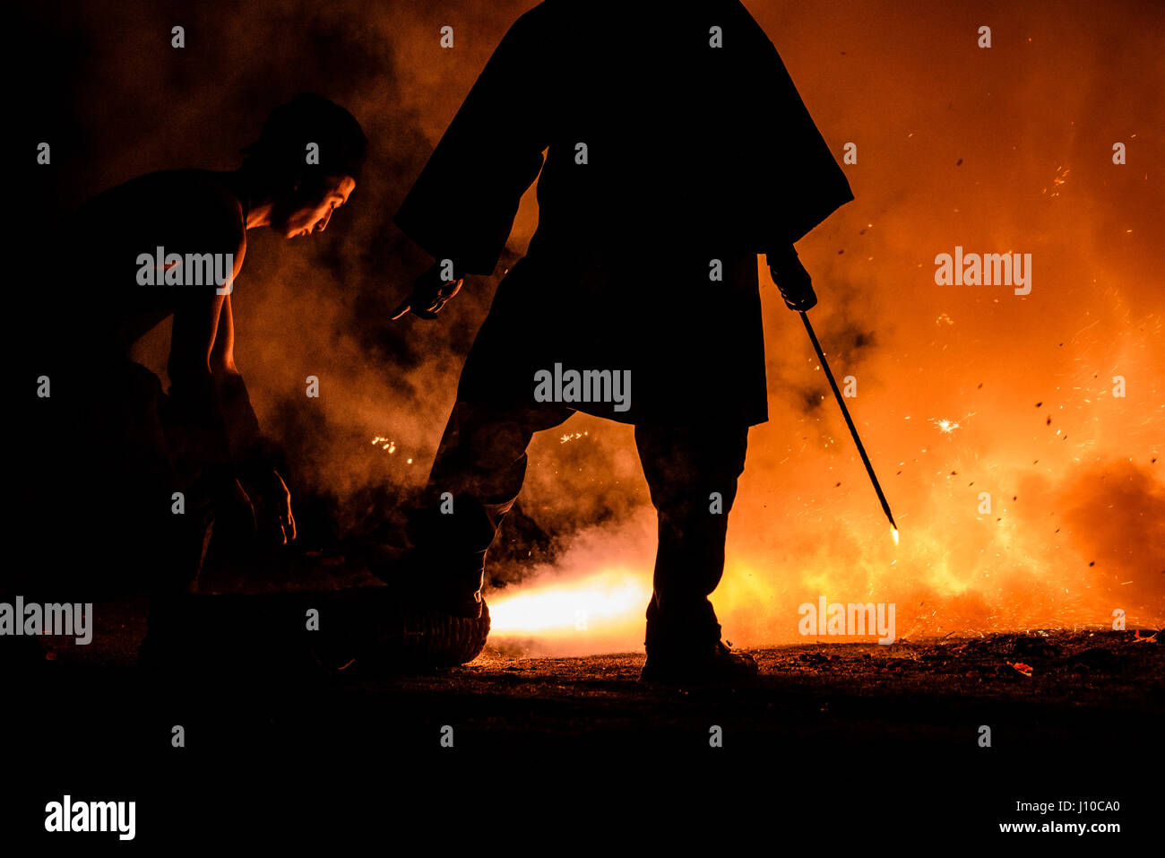 APRIL 15, 2017 - Men launch handheld fireworks, known as tezutsu hanabi ...