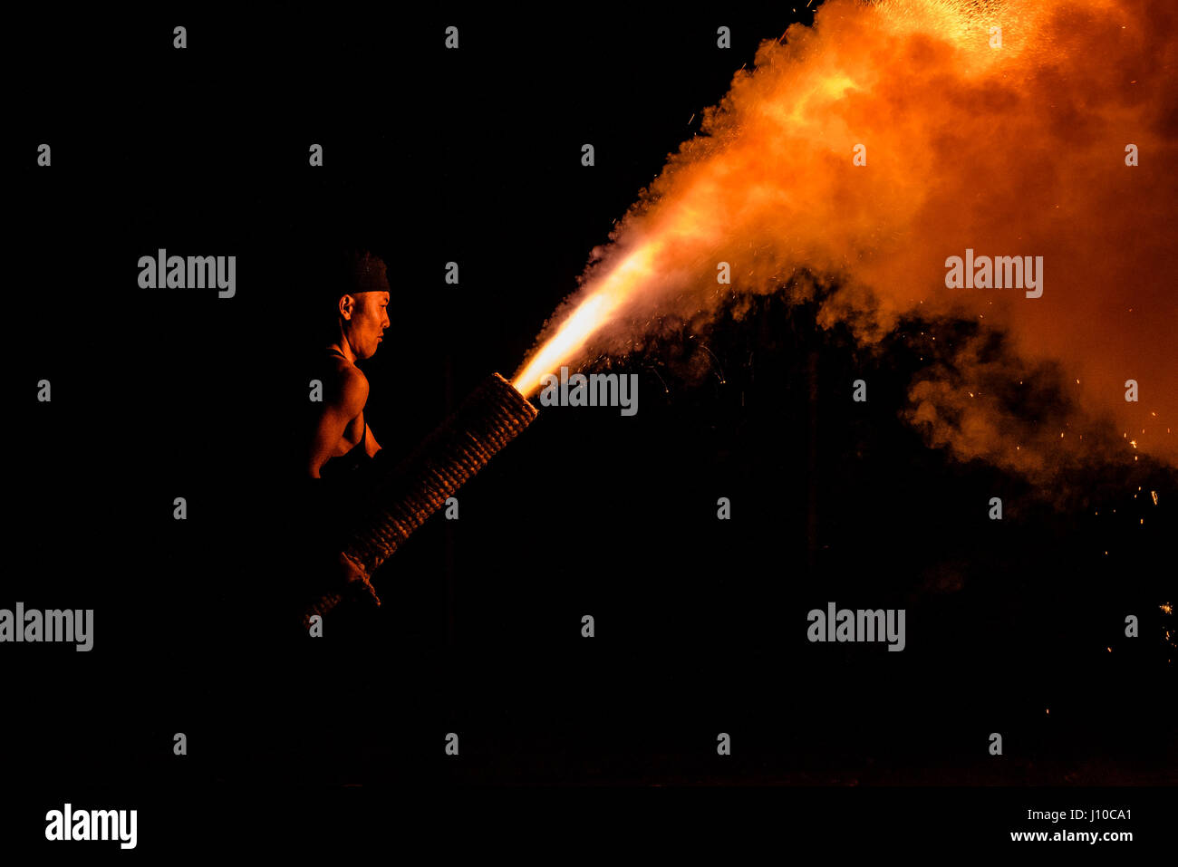 APRIL 15, 2017 - Men launch handheld fireworks, known as tezutsu hanabi ...