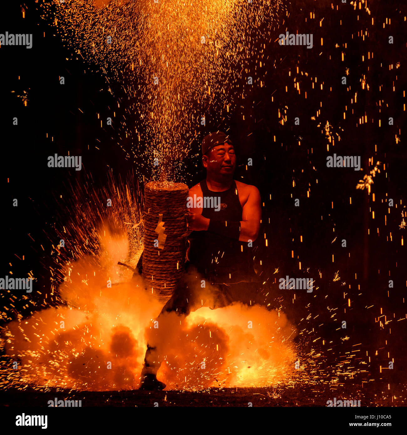 APRIL 15, 2017 - Men launch handheld fireworks, known as tezutsu hanabi ...