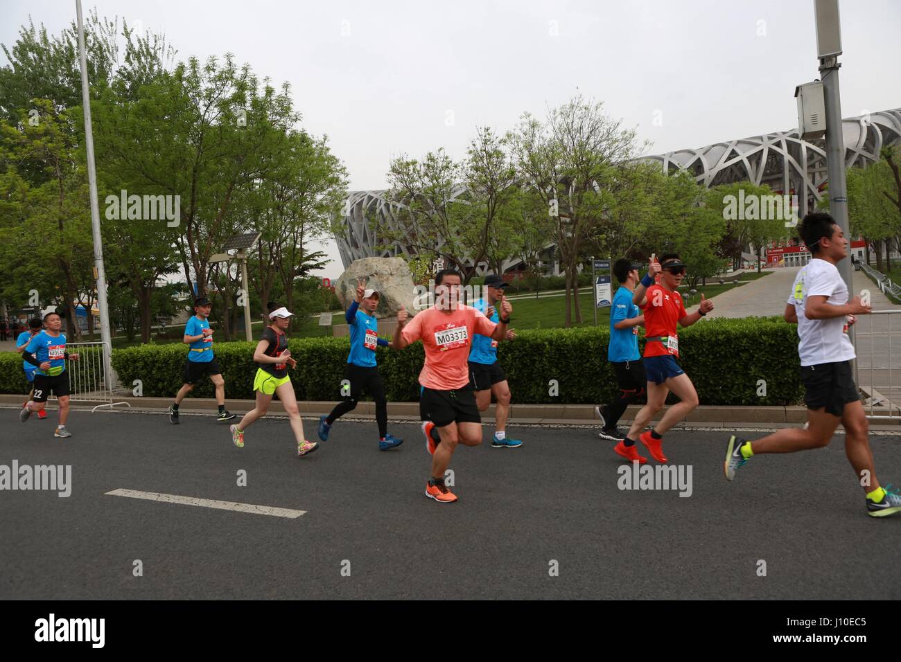 Beijing, China. 17th Apr, 2017. More than 21,000 runners from about 20 ...