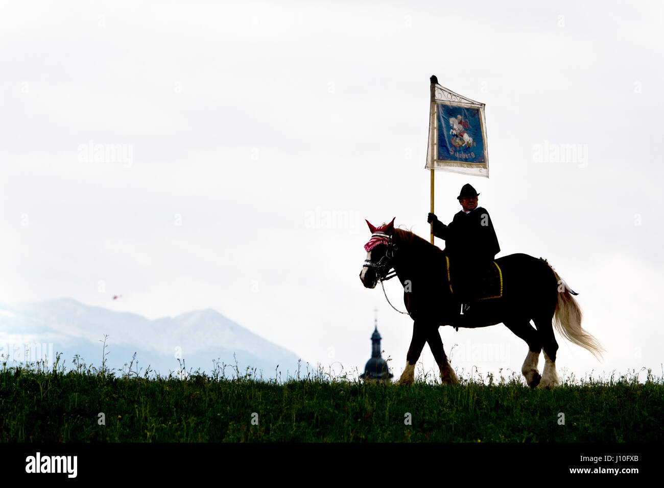 Trauenstein, Germany. 17th Apr, 2017. People in traditional attire ride ...
