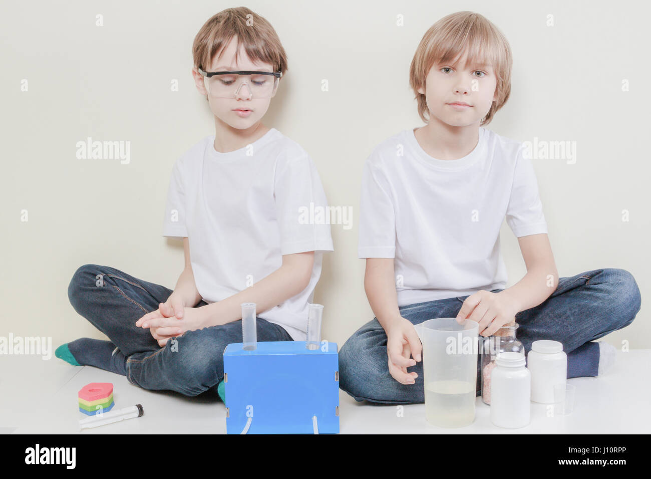 Little scientists preparing to make science experiments. Education ...