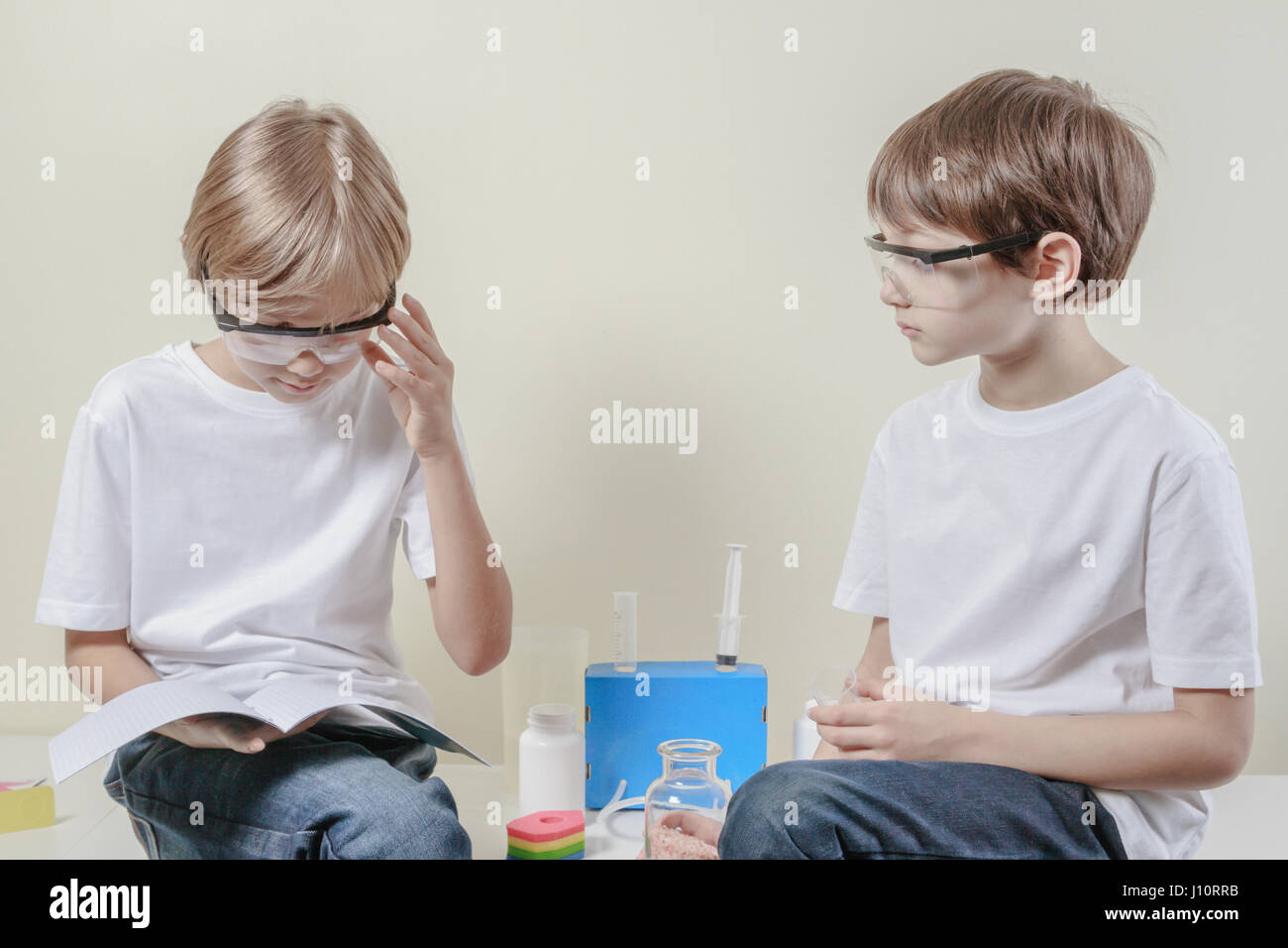 Kids preparing to make science experiments. Education concept Stock ...