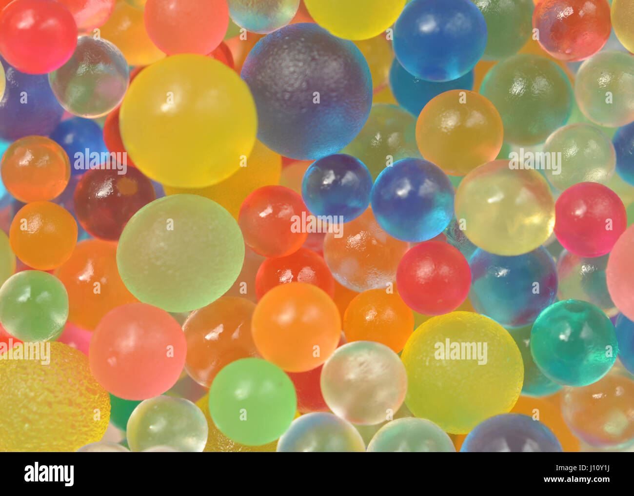 Background made with scattered color gel balls Stock Photo - Alamy