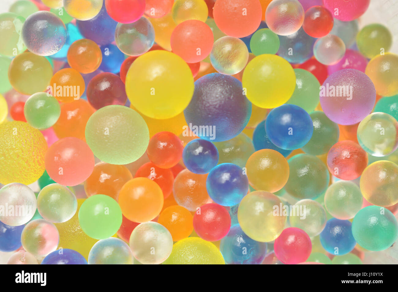 Background made with scattered color gel balls Stock Photo - Alamy