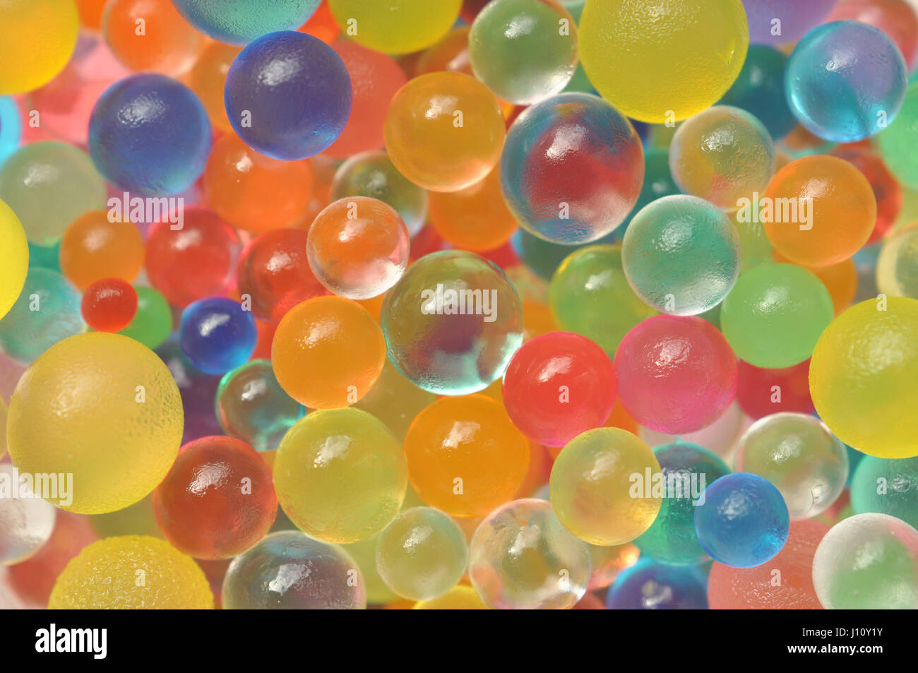 Background made with scattered color gel balls Stock Photo - Alamy