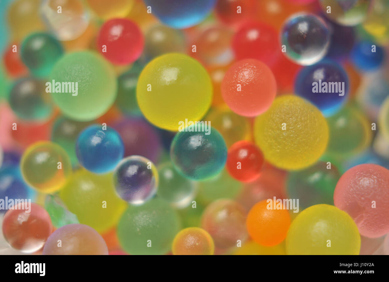 Background made with scattered color gel balls Stock Photo - Alamy