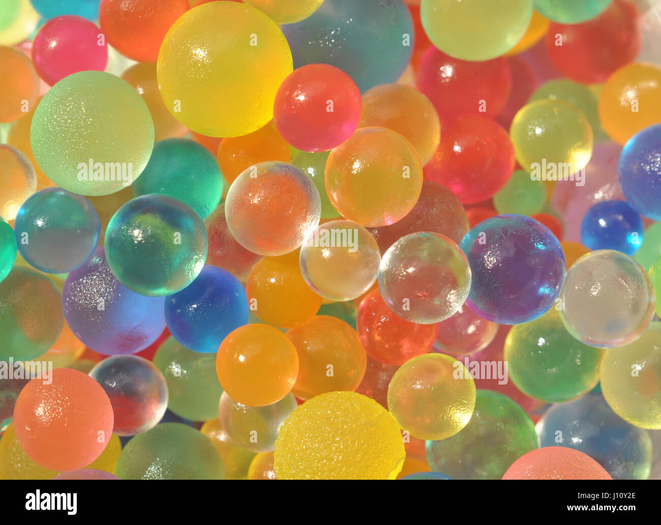 Background made with scattered color gel balls Stock Photo - Alamy