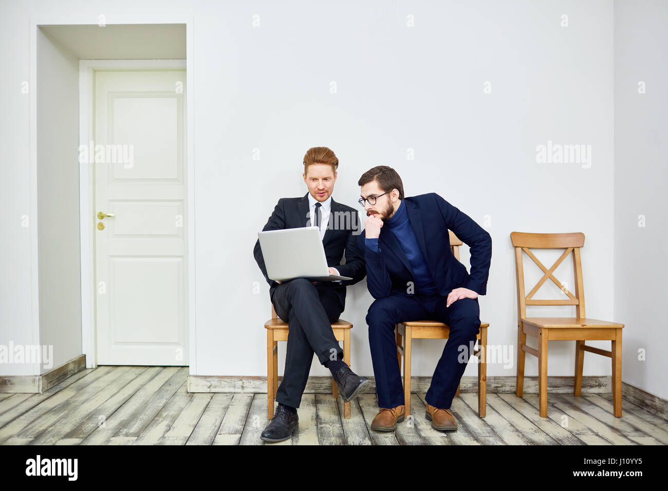 People Waiting Outside Office High Resolution Stock Photography and ...
