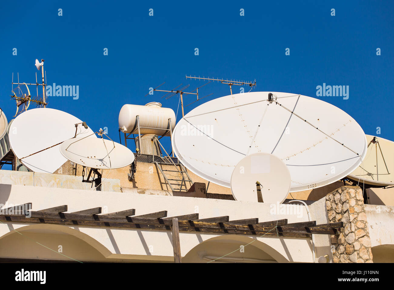 Satellite dish on the roof Stock Photo - Alamy
