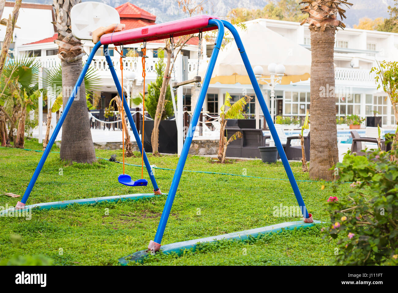 Children swing at Playground Stock Photo - Alamy