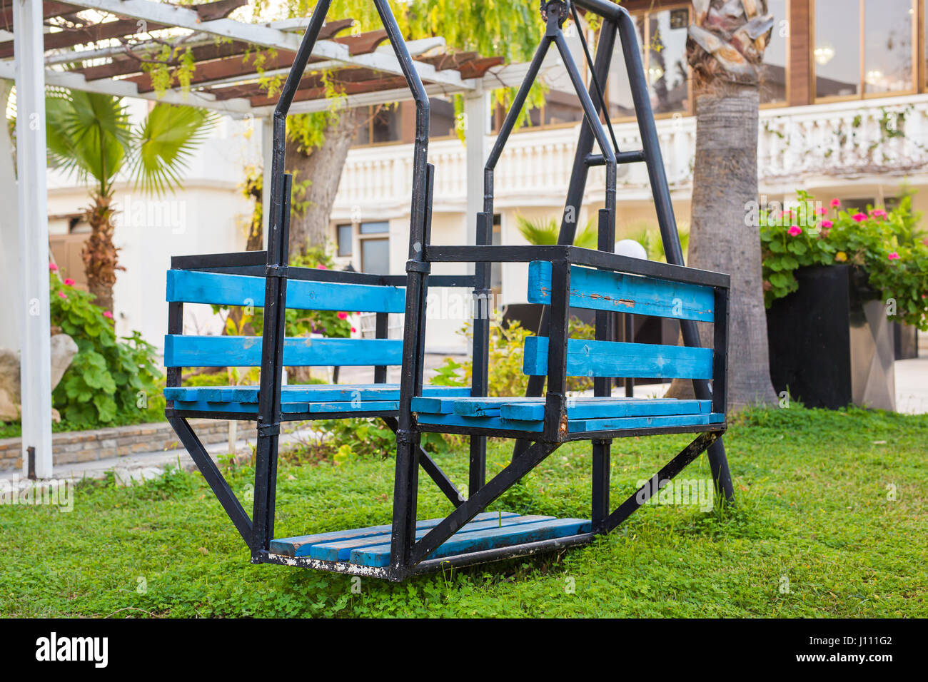 Children swing at Playground Stock Photo - Alamy