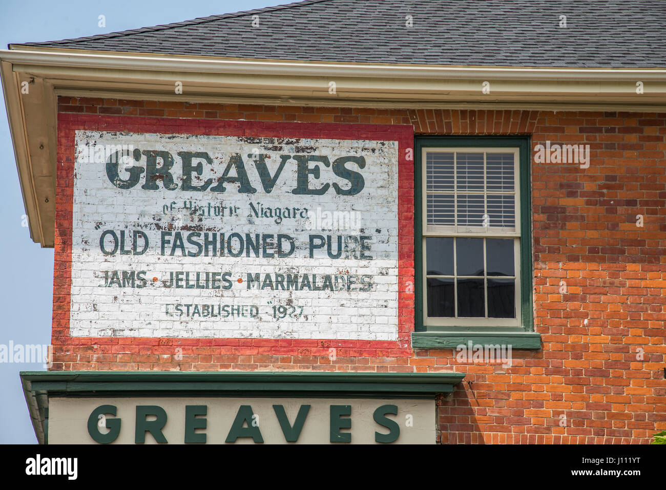 The Greaves sign painted on the side of the store just below the roof ...