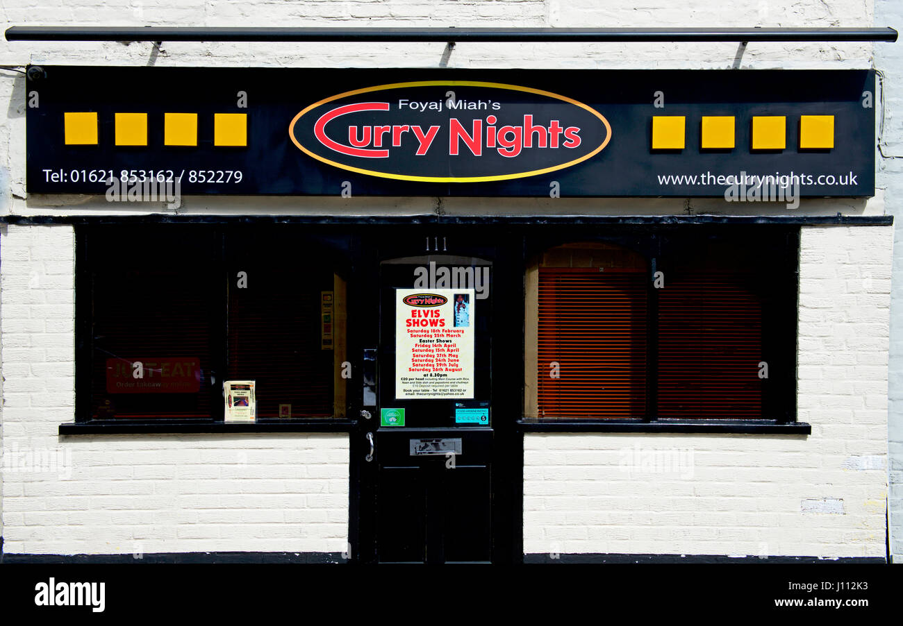 Sign announcing appearance of an Asian Elvis in a curry restaurant in ...