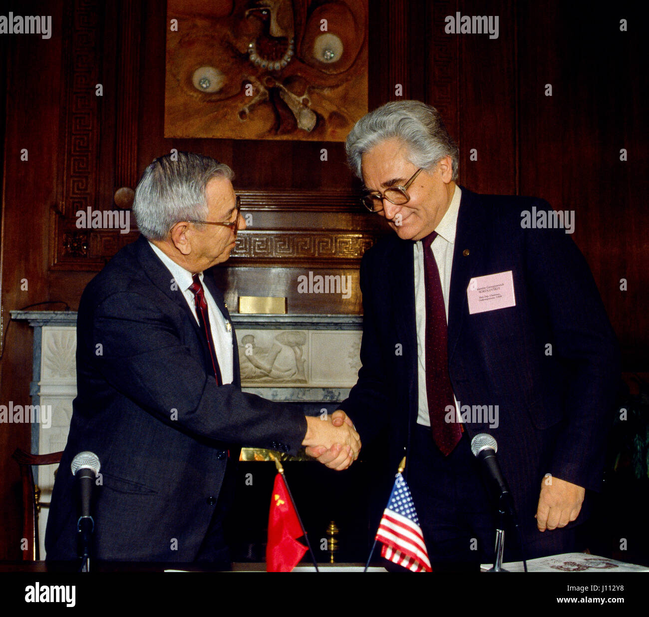 Secretary of the Interior Manuel Lujan shakes hands with First Deputy ...