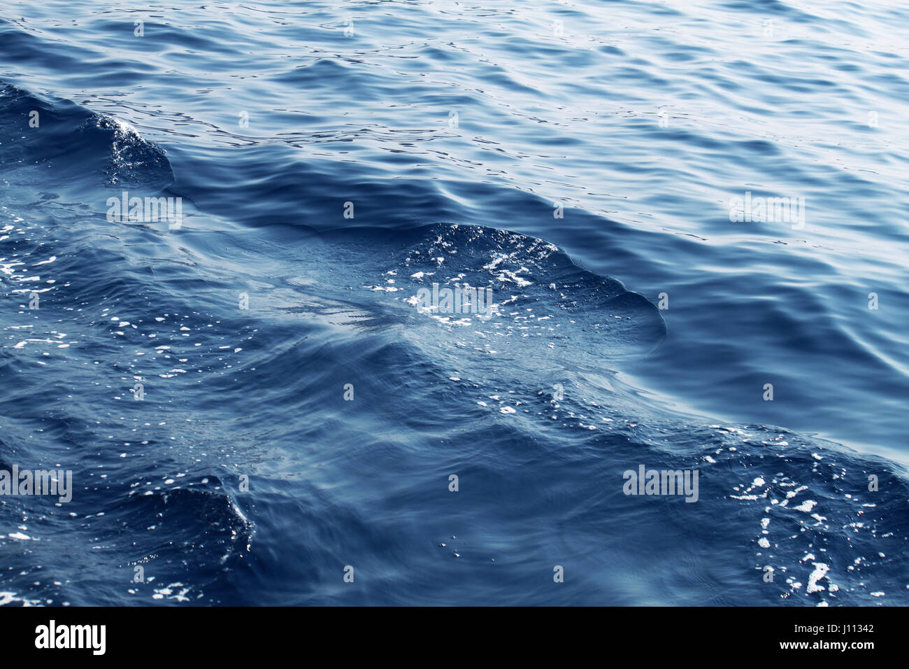 Blue water background Stock Photo - Alamy