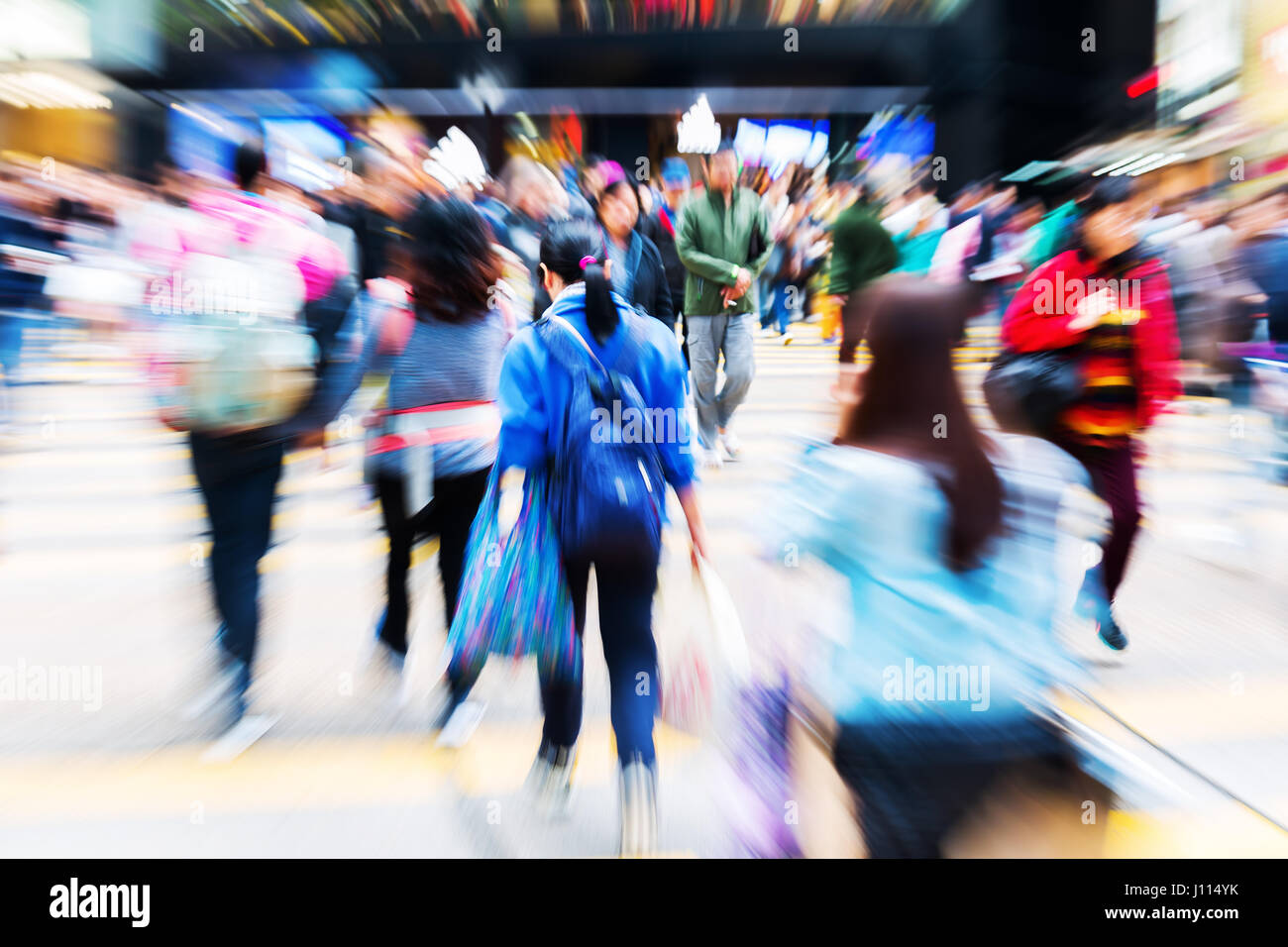busy crowd of people in the city with camera made zoom effect Stock ...