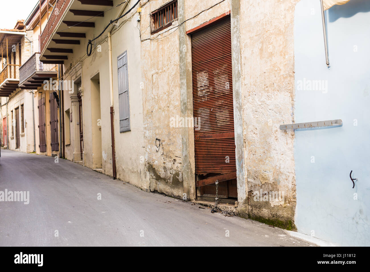 Beautiful view of scenic narrow alley with historic traditional houses ...