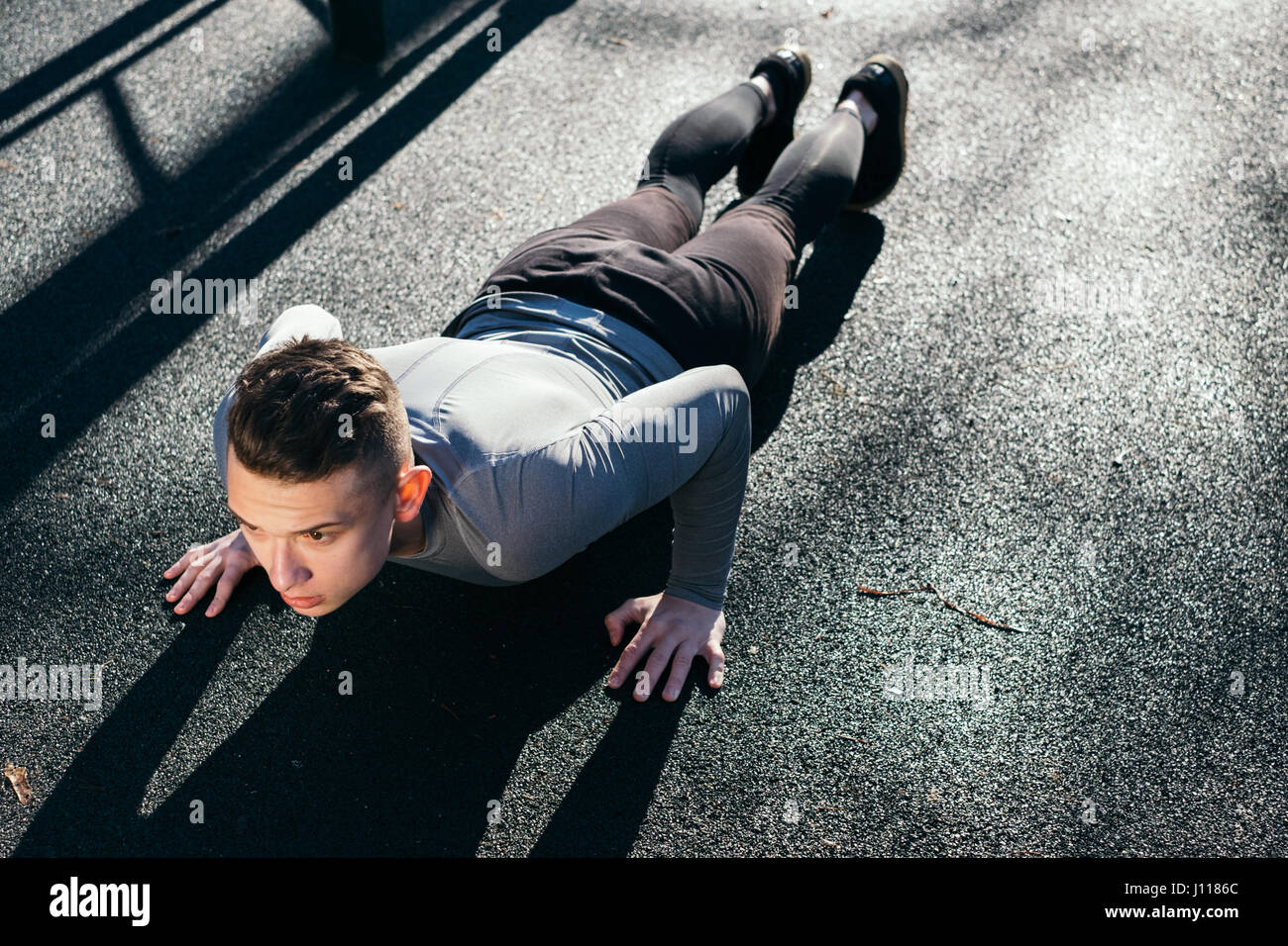 Man doing press-ups in the park, Minsk, Belarus Stock Photo - Alamy