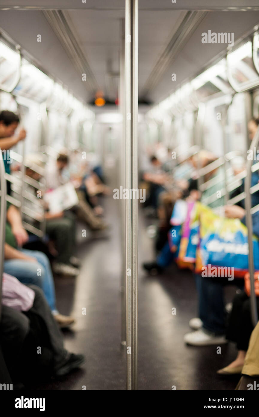 People on a subway train Stock Photo - Alamy